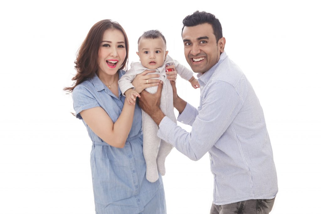 expressive parents with their cute son | Ruah Woods Institute